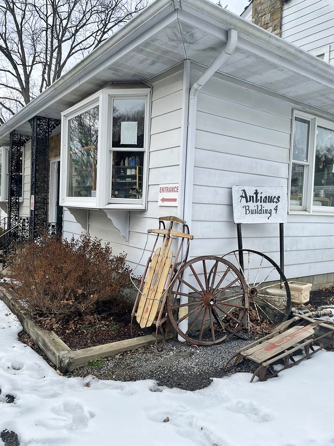 Those charming vintage sleds and wheels outside hint at the carefully curated treasures waiting within.