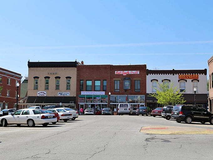 The storefronts on this street have a genuine, timeless appeal that makes one want to step inside and explore.