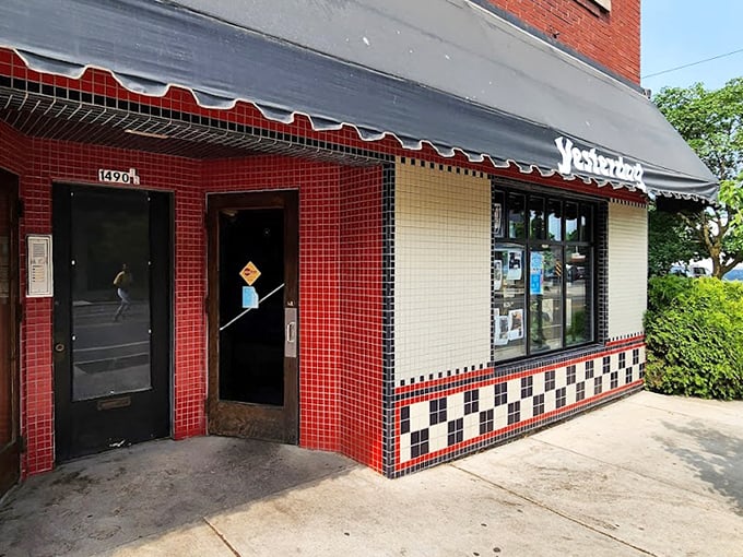 The classic red brick and checkered trim whisper tales of countless satisfied customers through the decades.