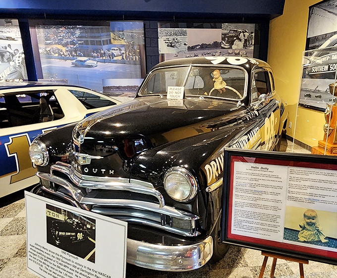 Drive Daddy Drive – the perfect motto. This gleaming black Plymouth represents NASCAR's early days when stock cars were actually stock.