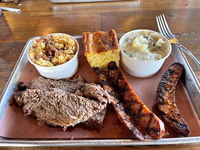 The two-meat platter: when making decisions is too hard and FOMO is real. That cornbread isn't just a side&mdash;it's an edible napkin.