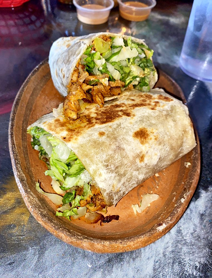 When a burrito is this perfectly grilled, with ingredients spilling out like they can't wait to meet you, resistance is futile.