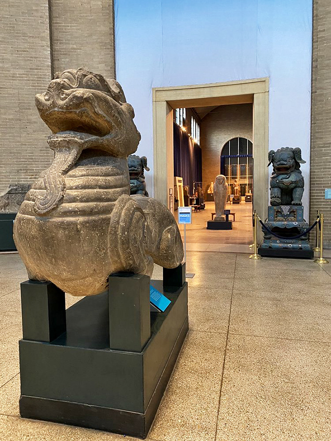 Stone guardians flank doorways like ancient bouncers with infinitely more class and patience.