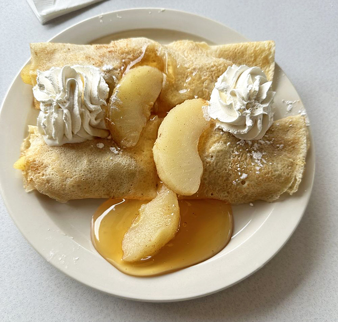 Apple crepes that make you wonder why you don't eat dessert for breakfast more often. The answer: because they're rarely this good.
