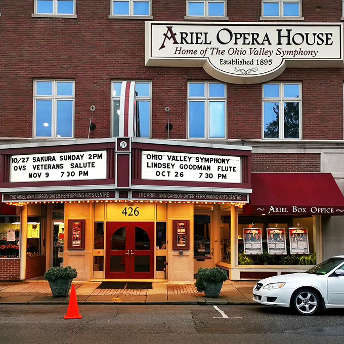 The Ariel Opera House marquee announces cultural offerings that would surprise big-city visitors, bringing symphony sounds to this riverside community since 1895.