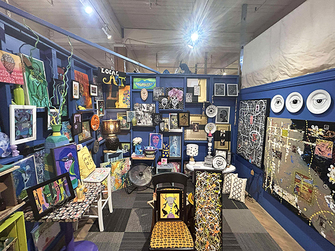 A vibrant explosion of local art transforms this booth into a gallery where every wall tells a different story.