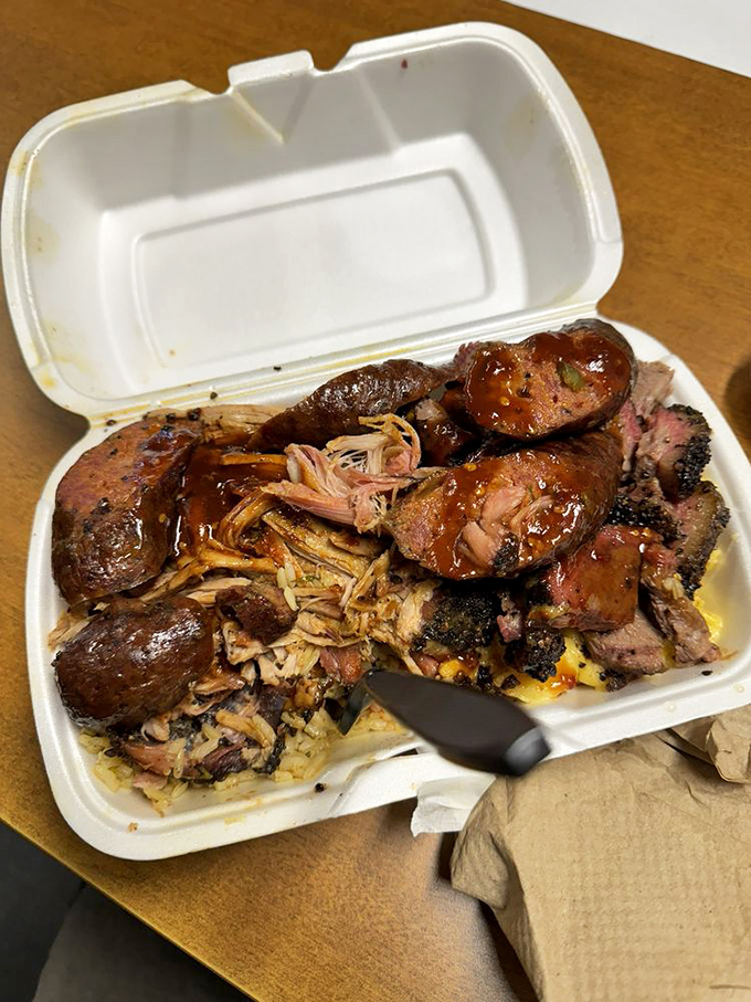 A barbecue bowl that proves good things come to those who don't mind a little sauce on their shirt and happiness in their heart.