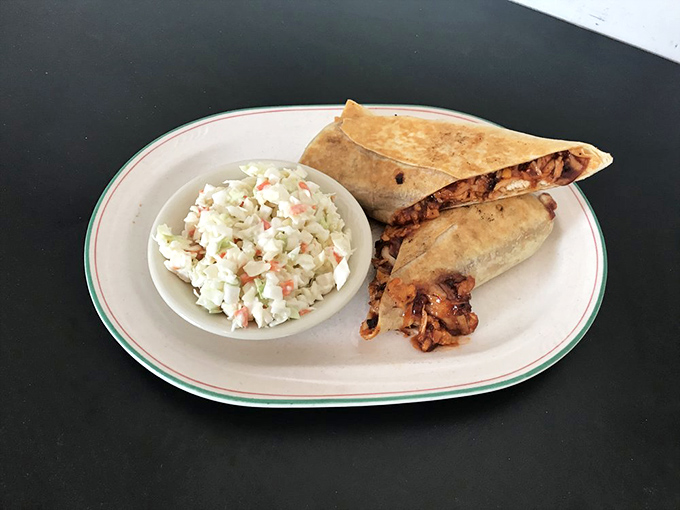 This wrap isn't just lunch&mdash;it's a perfectly engineered flavor delivery system, with coleslaw standing by as the unsung hero of the plate.