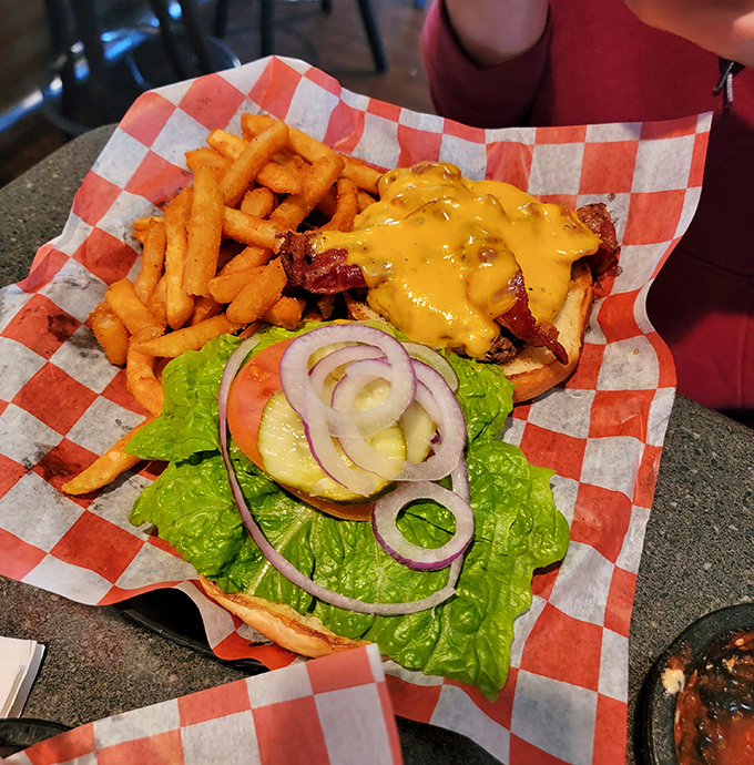 This burger doesn't just satisfy hunger; it negotiates peace treaties between your taste buds and makes Wednesday feel like Saturday.