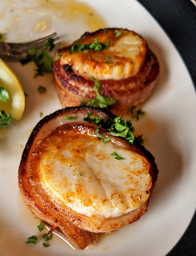 Bacon-wrapped scallops: proof that two perfect things can become something even better, like Lennon meeting McCartney.