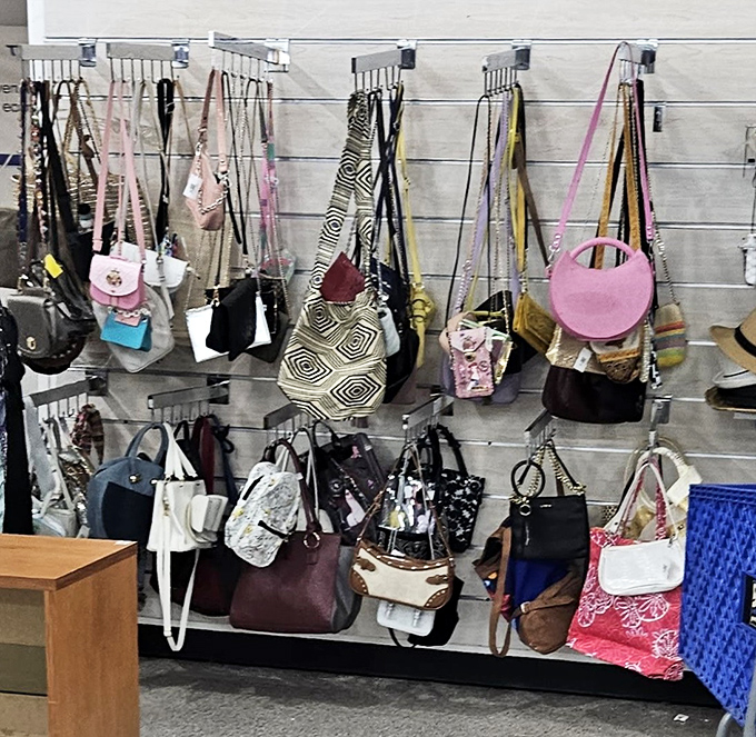 Handbag heaven! Designer dreams and practical purses hanging side by side&mdash;the ultimate democratic fashion statement.