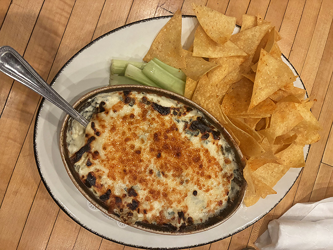 Bubbling cheese dip that whispers, "Diet tomorrow." Paired with crispy tortilla chips, it's the appetizer that ruins appetites—in the best possible way.
