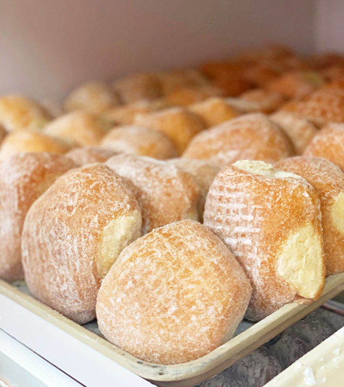 Bavarian-filled donuts &ndash; where the cream-to-dough ratio achieves mathematical perfection. Each bite delivers the custard payload you've been dreaming of.