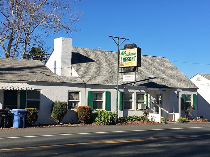 Beachcomber Resort channels mid-century charm with its white walls and green shutters. Retro vibes without the Instagram filter.