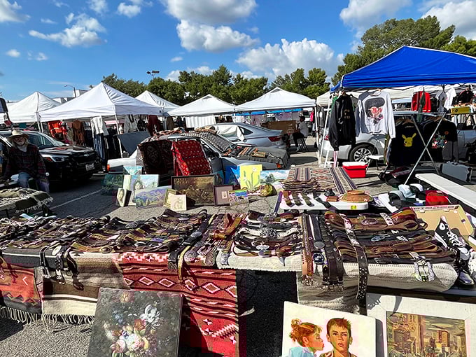 A tapestry of textures and patterns spread across tables like an archaeological dig through decades of design. Yesterday's art becomes today's find.