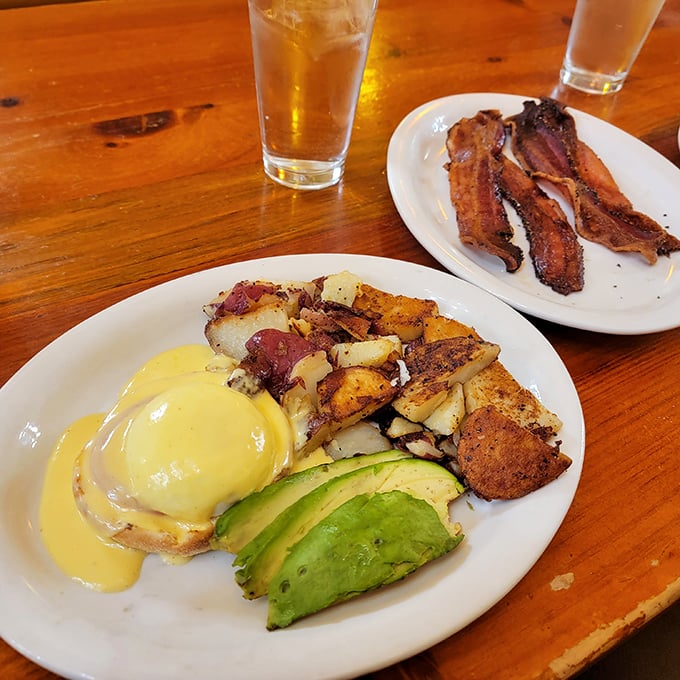 Benedict meets avocado in a hollandaise-drenched union that would make any brunch enthusiast weak in the knees.