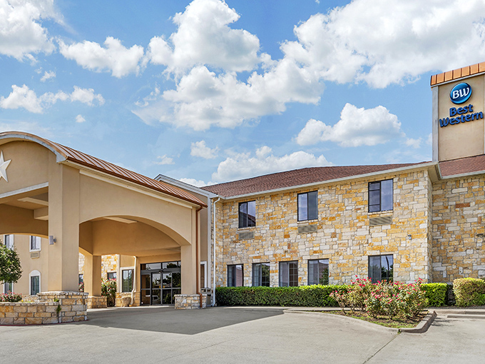 The Best Western offers Texas-sized hospitality with its stone facade and convenient location, proving small towns can deliver big comfort to weary travelers.