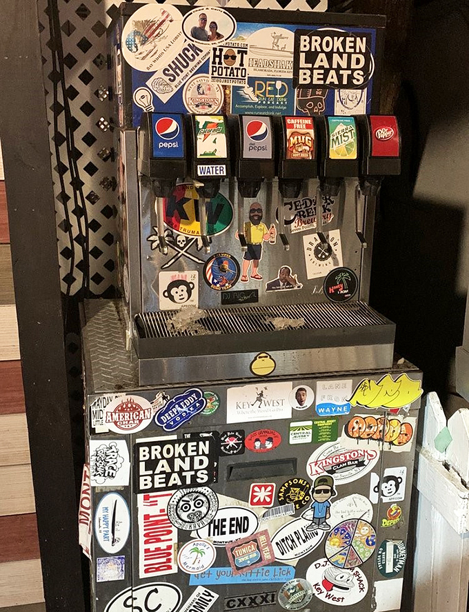 A soda fountain covered in stickers tells stories of travelers past. In Key West, even the beverage station has personality and refuses to be ordinary.