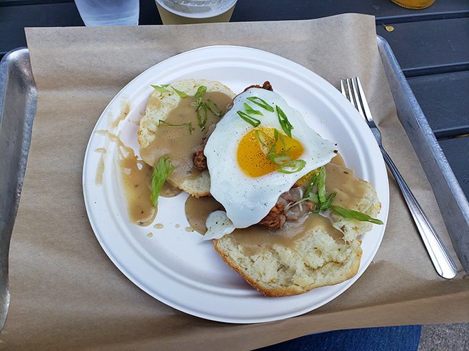 Breakfast meets comfort food in this open-faced masterpiece, where the sunny-side egg creates its own sauce of liquid gold.