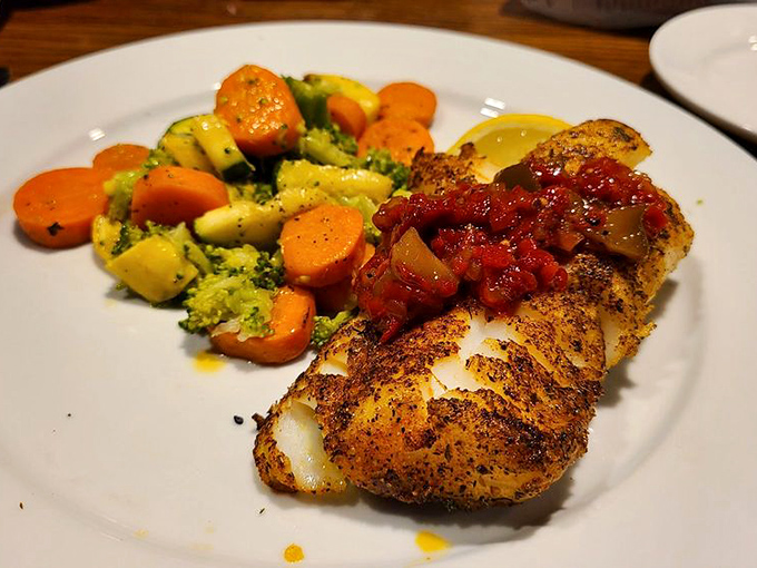 Blackened cod with a spice crust that means business, topped with a tomato relish that's its perfect dance partner.