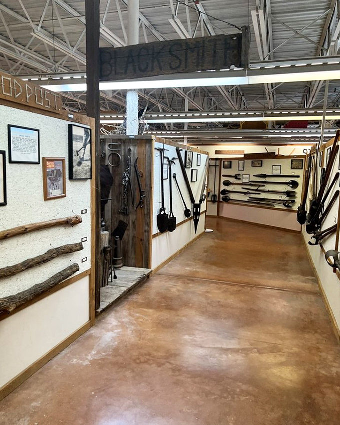 The blacksmith's tools hang like sleeping warriors, each one having hammered out the boundaries of countless American dreams.