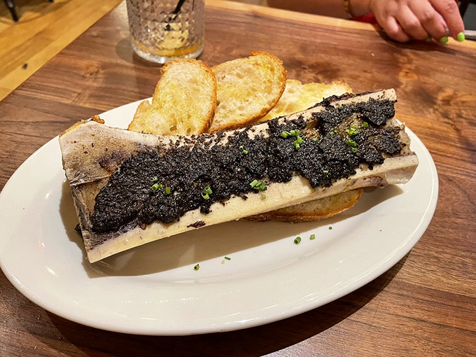 Bone marrow on toast: where primal meets refined. It's caveman food that somehow feels sophisticated enough for royalty.