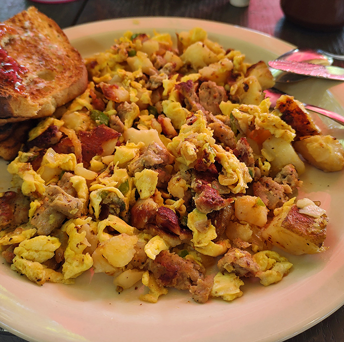 This breakfast scramble contains more delicious ingredients than most people's weekly grocery list &ndash; a beautiful chaos of eggs, potatoes, and savory treasures.