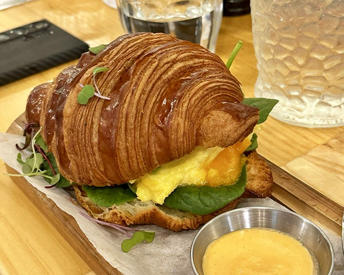 A breakfast croissant sandwich that makes you wonder why we ever settled for English muffins&mdash;flaky, buttery, and unapologetically indulgent.