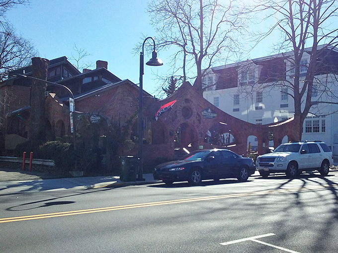 Bright facades paint the street in rainbow hues, like someone decided beige was officially banned from downtown.