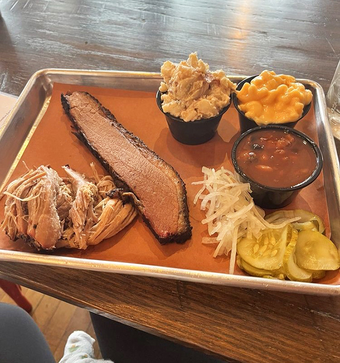 Two meats, multiple sides &ndash; this tray contains more happiness per square inch than a puppy convention.