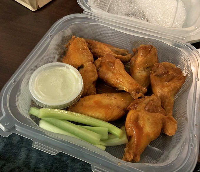 Wings that don't need gimmicky flavors or Instagram filters&mdash;just honest Buffalo heat, crispy skin, and the dignity of being served with proper celery sticks.