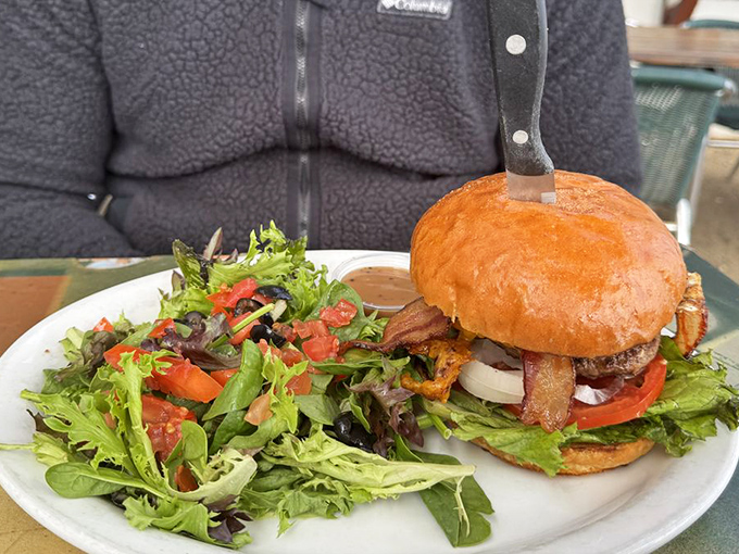 The burger that launched a thousand return visits &ndash; perfectly stacked, nestled in a pillowy bun, with a salad trying to claim it's health food.
