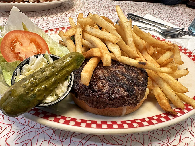 A burger that commands respect&mdash;perfectly charred, properly dressed, and accompanied by fries that clearly graduated with honors.