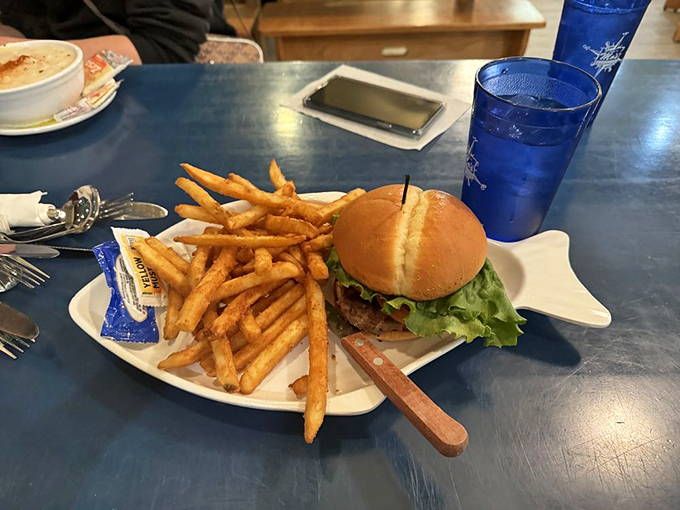 When a burger craving hits at a seafood joint, Mo's doesn't disappoint. Those golden fries could make a potato farmer weep with pride.