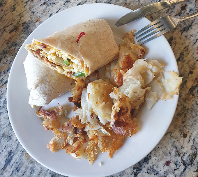 That breakfast burrito is wrapped tighter than Fort Knox, keeping all that eggy, potato goodness safely inside.