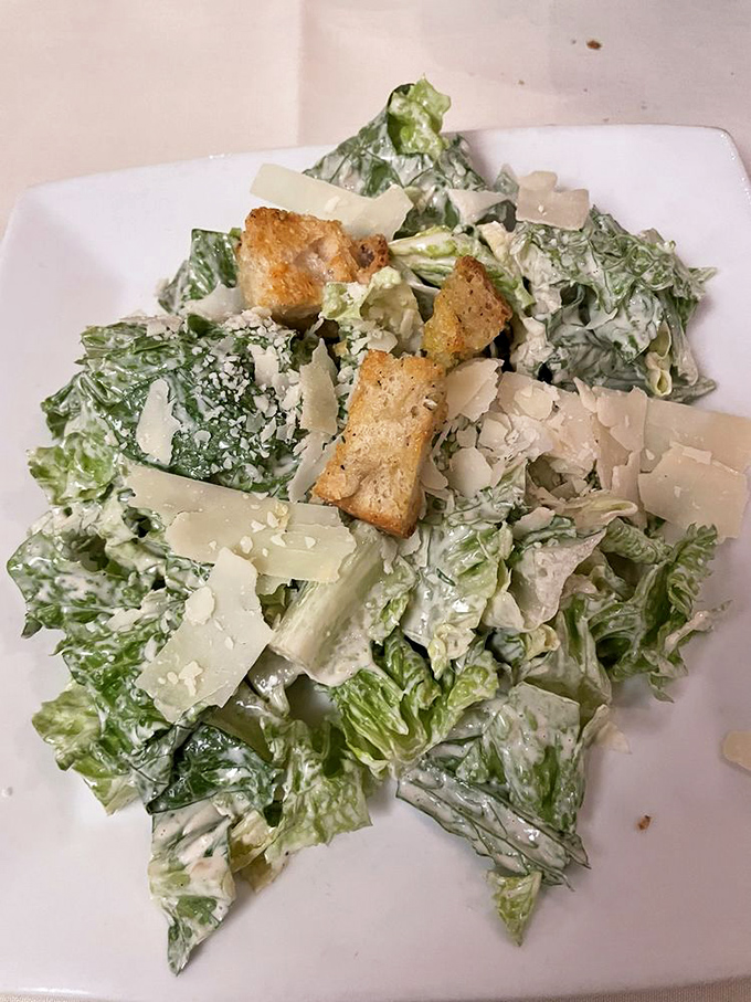 A Caesar salad that Julius himself would approve&mdash;crisp romaine, house-made croutons, and parmesan shavings in perfect proportion.