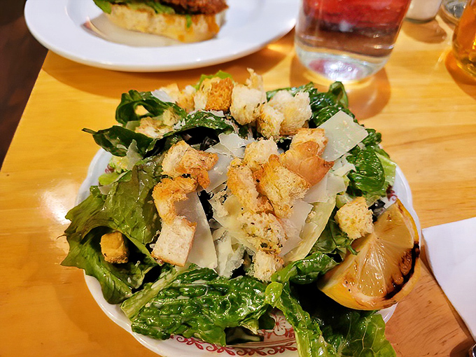 Even the side salad gets the royal treatment here, proving that supporting players deserve Oscar-worthy performances too.