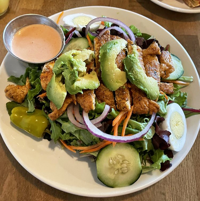 A salad that doesn't feel like punishment. Fresh greens, protein, and avocado create the rare healthy dish you'll actually crave again.