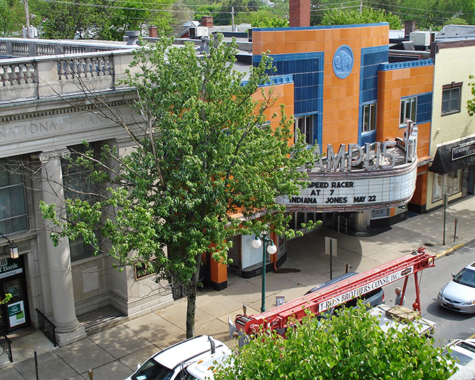 The historic Campus Theatre's marquee lights up downtown, offering entertainment without the need for second mortgages disguised as ticket prices.