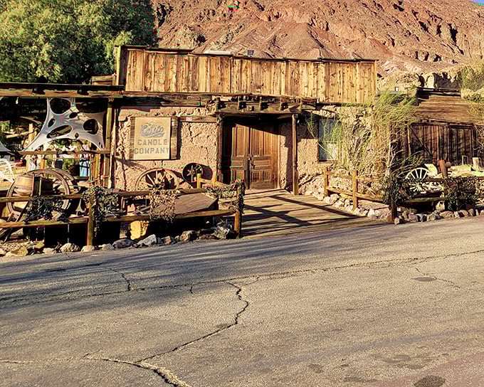 The Calico Candle Company showcases frontier resourcefulness with its rustic facade. Wagon wheels and mining artifacts transform yesterday's tools into today's decor.