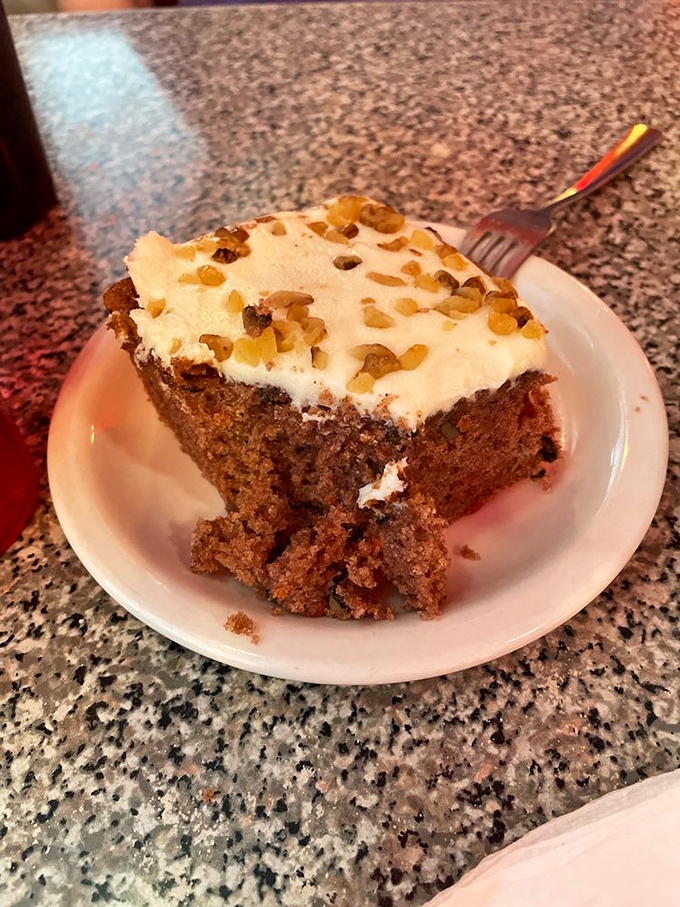 Carrot cake that strikes the perfect balance between spice and sweetness, with cream cheese frosting that would make grandmothers everywhere nod in approval.