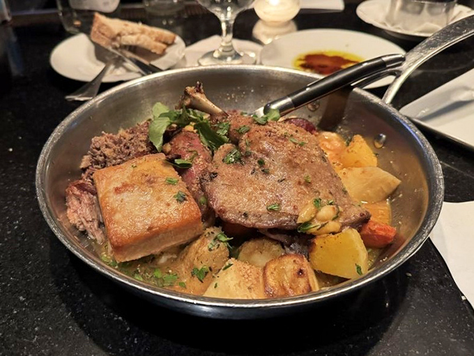 The cassoulet arrives like a rustic poem in a skillet&mdash;duck, pork, and beans having what appears to be the world's most delicious reunion.