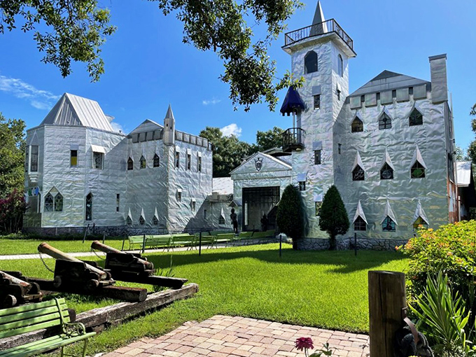 Flowering shrubs add splashes of color to the metallic landscape, proving that even knights in shining armor appreciate a good garden.