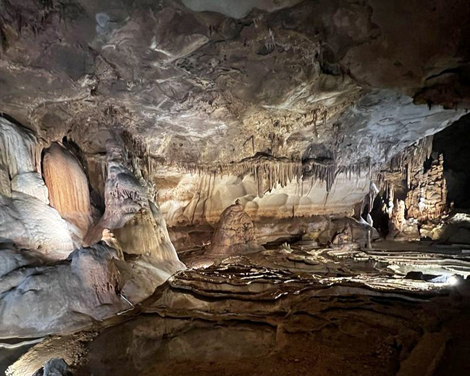 The cave's chambers unfold like rooms in a natural mansion. Each space has its own character, shaped by water's artistic touch over eons.