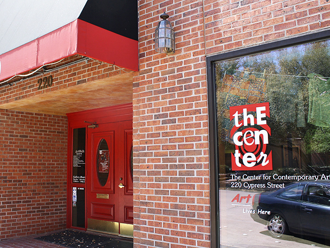 The Center for Contemporary Arts announces itself with a vibrant red door, inviting creative souls to step into Abilene's thriving artistic community.