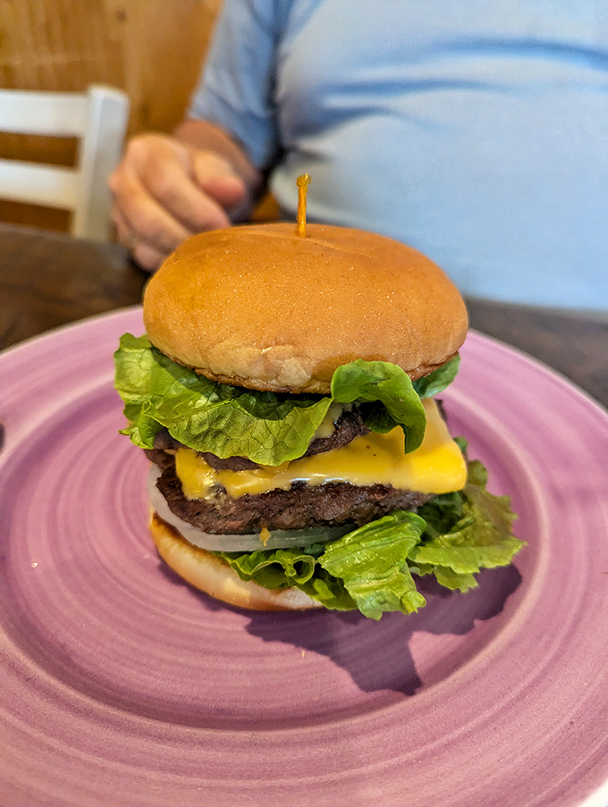 A burger that doesn't need gimmicks&mdash;just perfectly melted cheese, fresh lettuce, and a bun that knows its supporting role in this meaty production.
