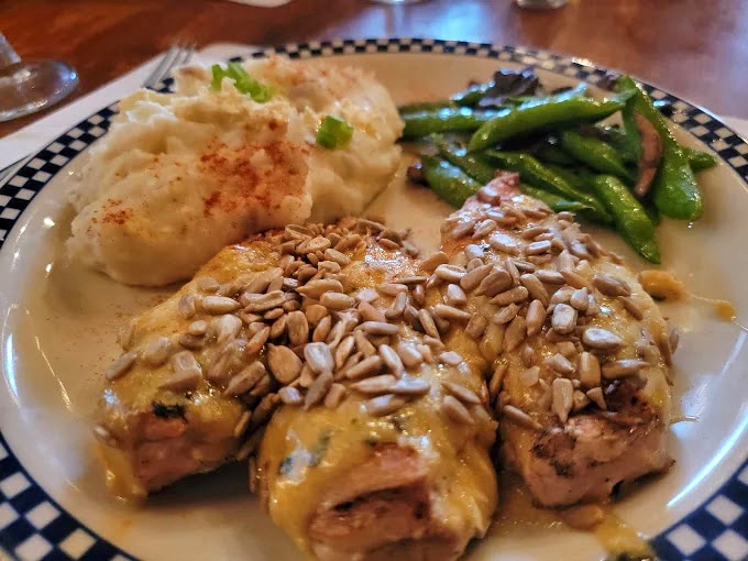 Those sunflower seeds aren't just garnish&mdash;they're the perfect textural counterpoint to chicken so tender you barely need teeth to enjoy it.