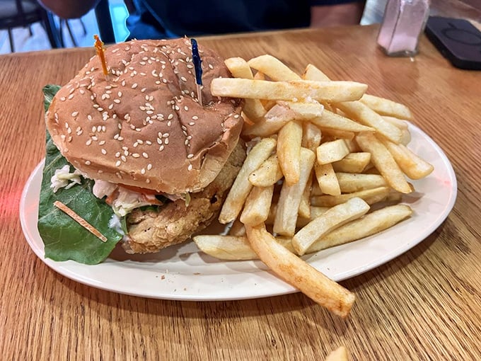 This isn't just a chicken sandwich&mdash;it's architecture, engineering, and art all stacked between two buns with crispy fries standing guard.