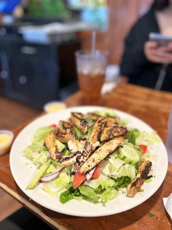 This grilled chicken salad proves that "eating light" doesn't mean sacrificing flavor&mdash;it's the lunch option that leaves you satisfied, not deprived.