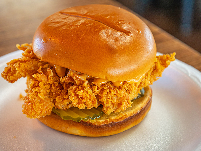A chicken sandwich that doesn't need fancy aioli or artisanal buns to impress—just honest-to-goodness crispy chicken that means business.